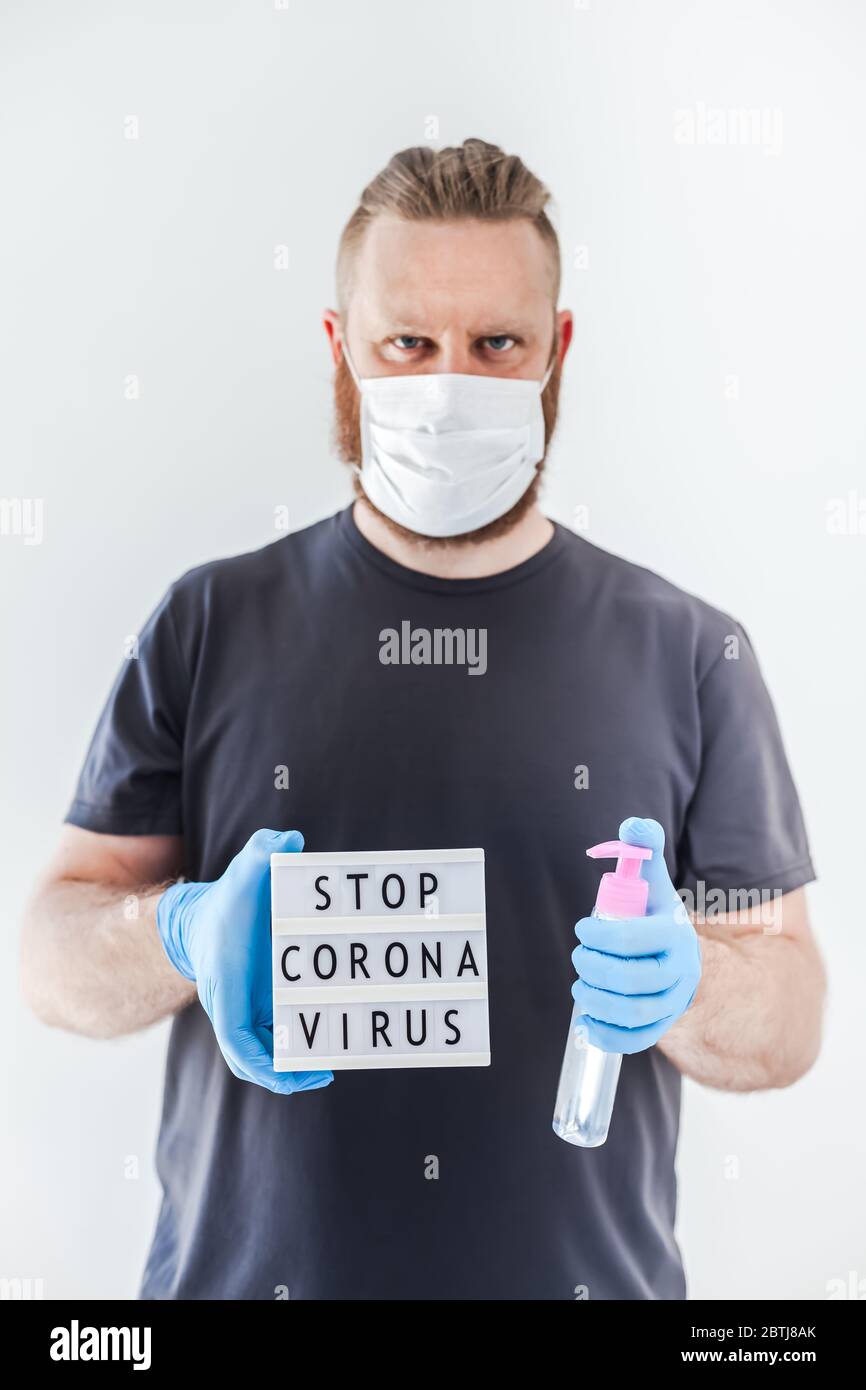 Hand sanitizer hygiene alcohol gel bottles and lightbox with text Stop ...