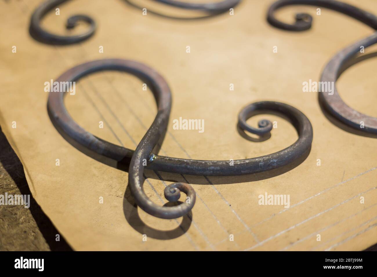 Blacksmith decorative elements at forge, workshop. Handmade ...