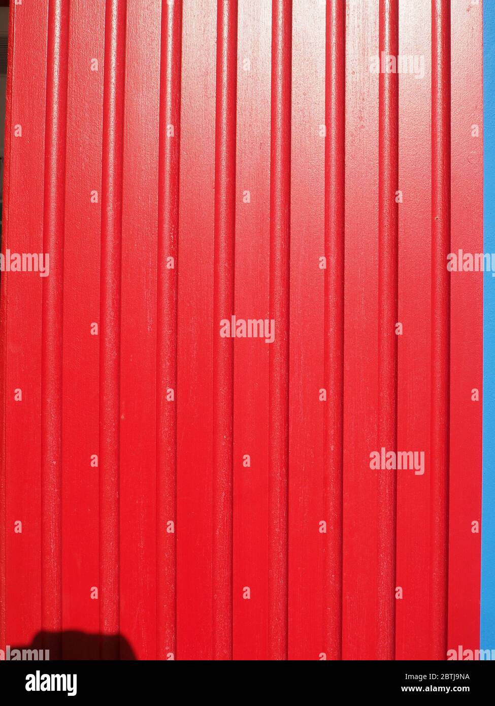 Red Wall panels Stock Photo - Alamy