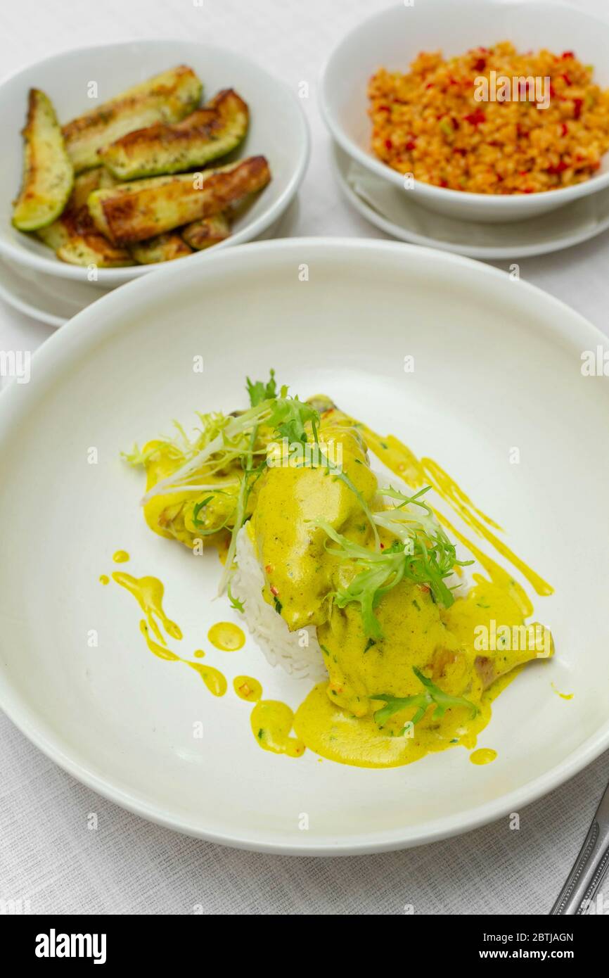 Chicken in curry sauce hi-res stock photography and images - Alamy