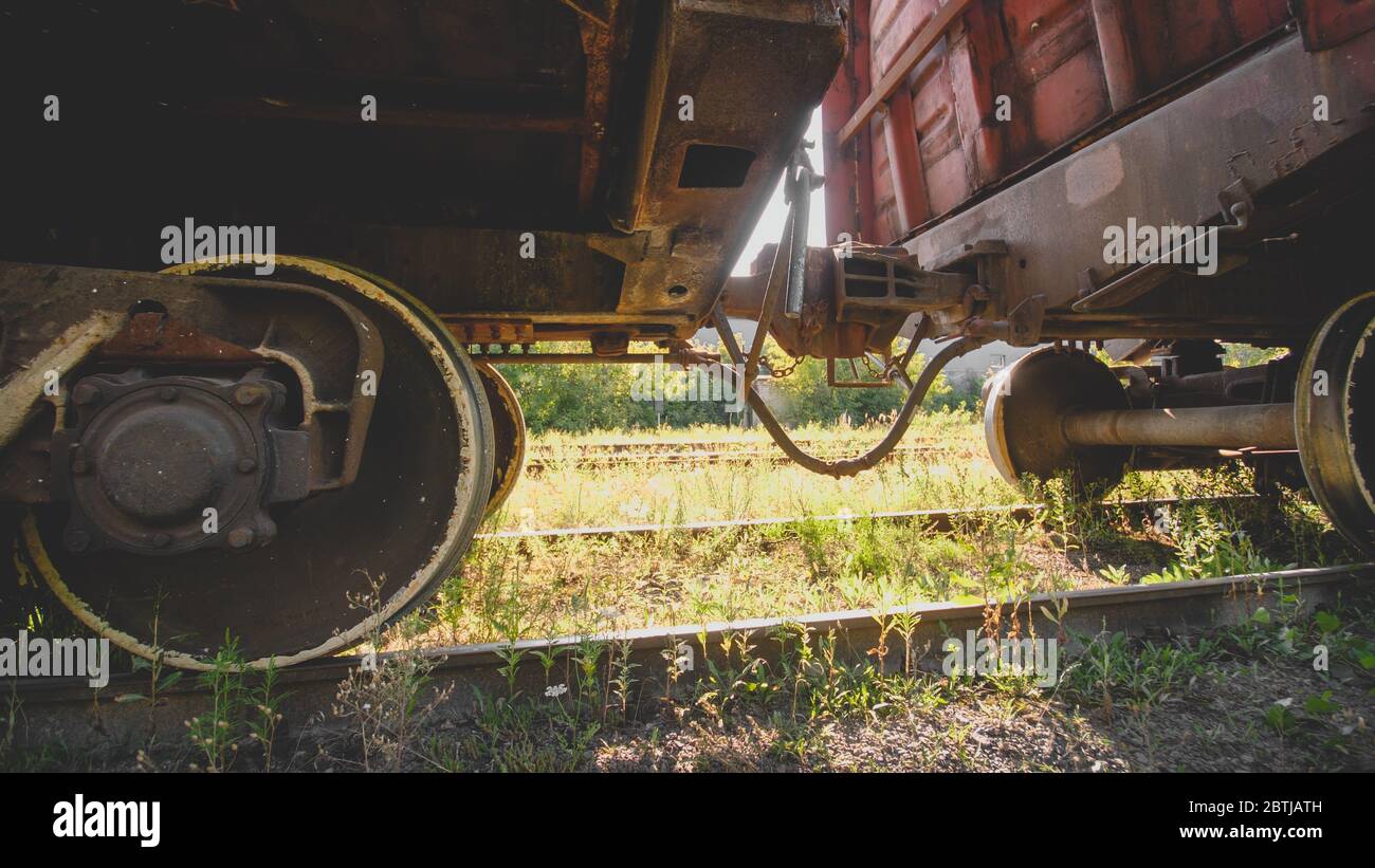 Two old rusty train cars connected with rusty coupler on railway Stock ...