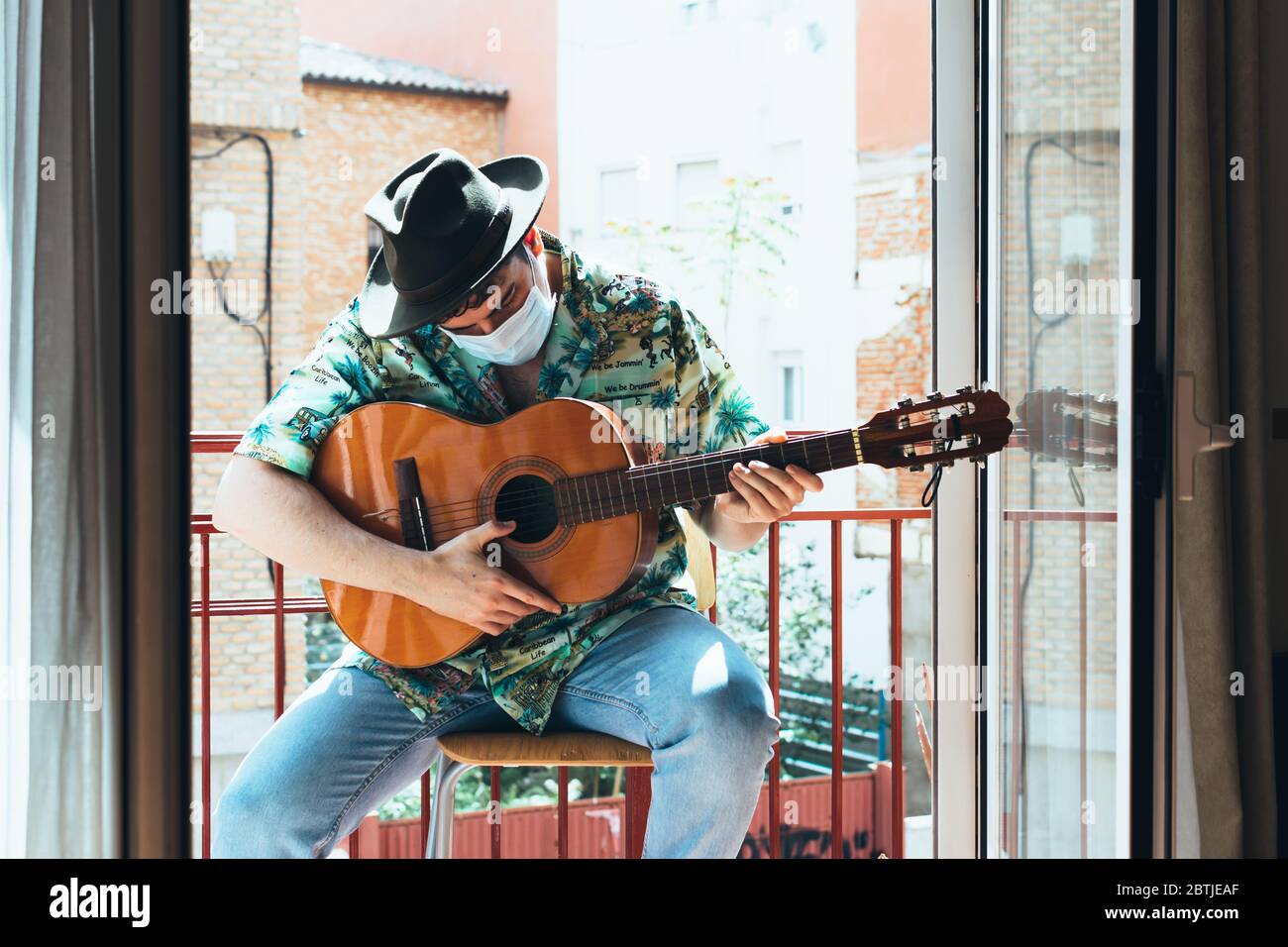 Musician On Balcony High Resolution Stock Photography and Images - Alamy