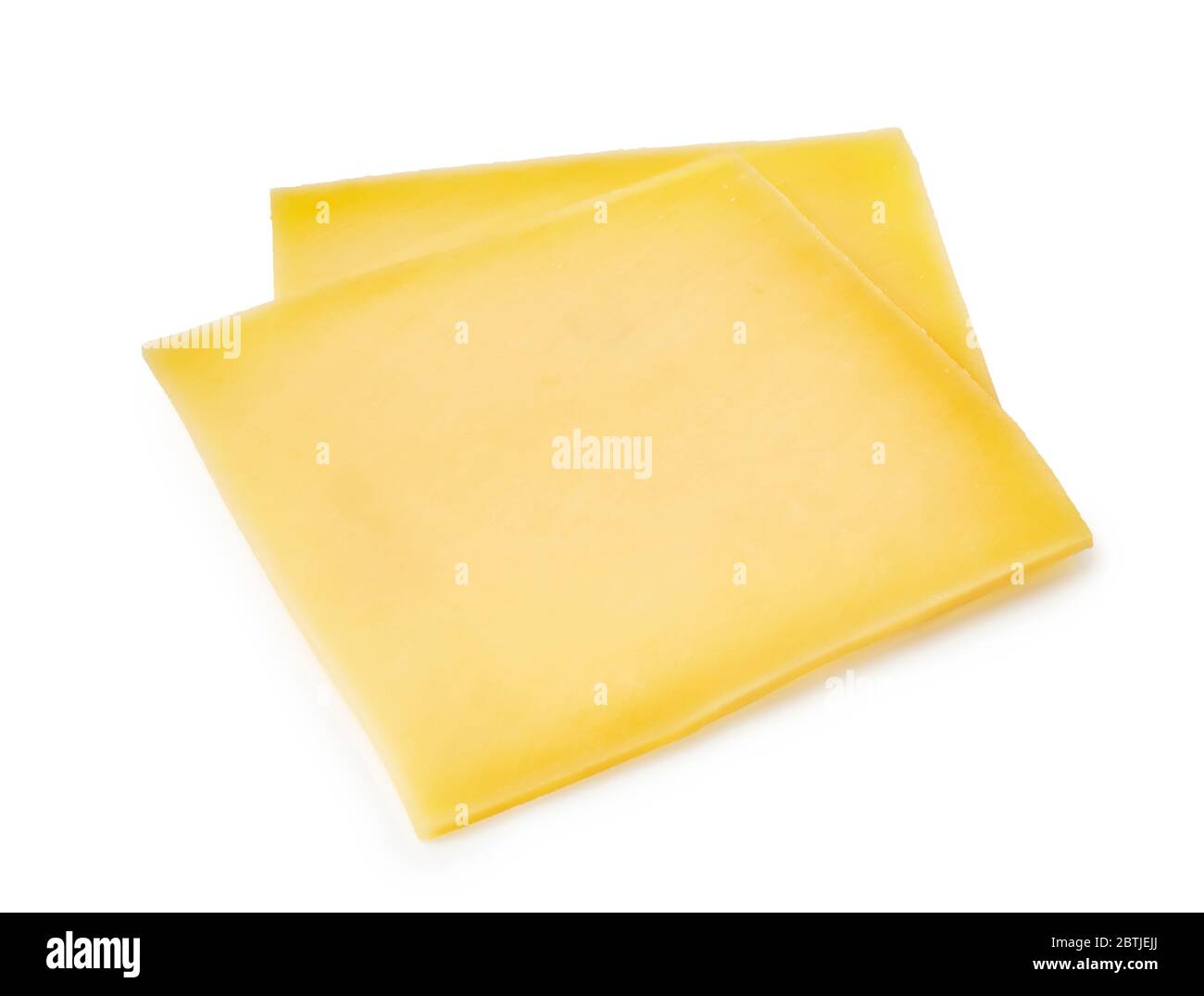 Two cheese slices isolated on white background Stock Photo - Alamy