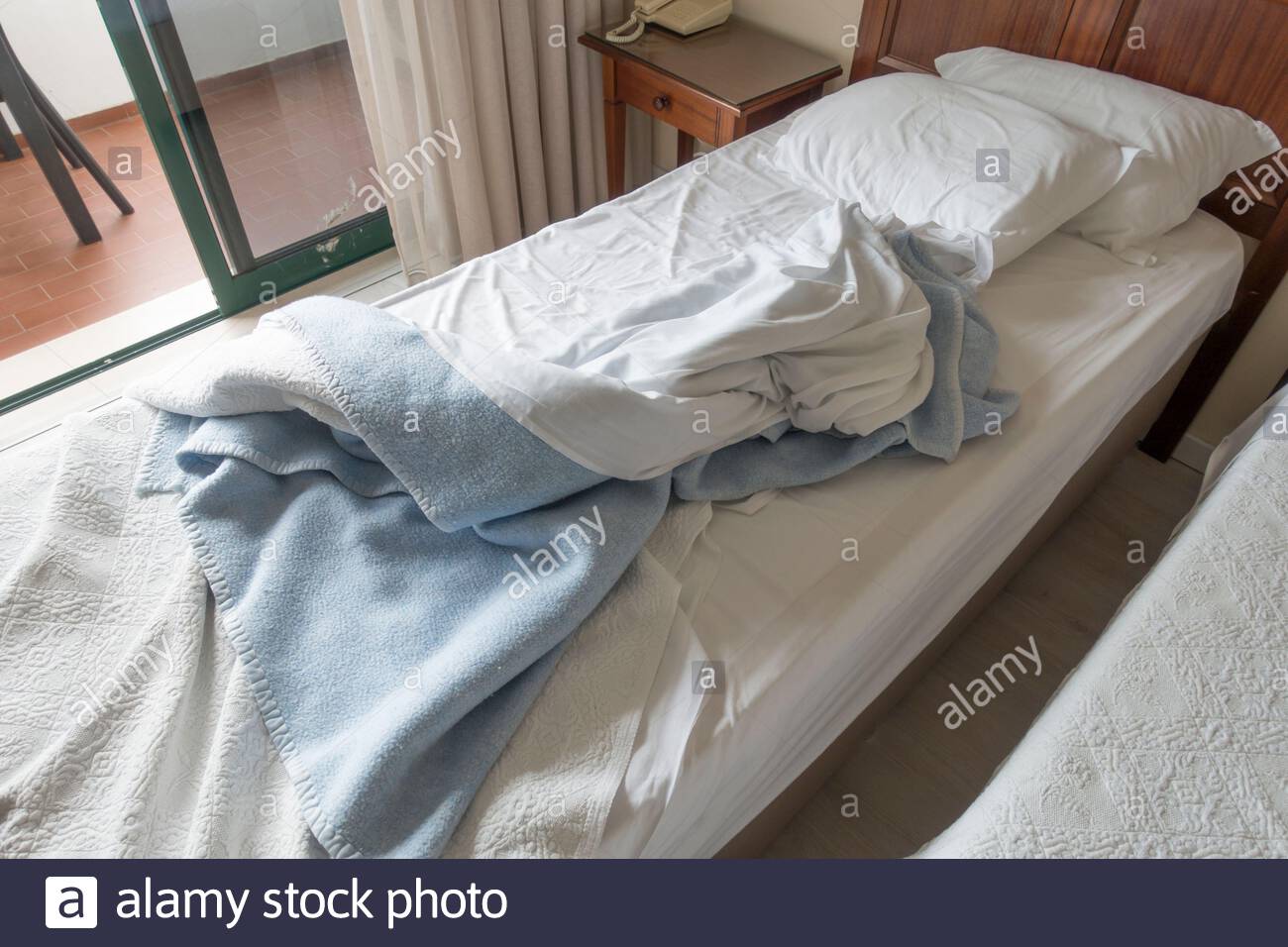 Unmade Hotel Bed High Resolution Stock Photography and Images - Alamy
