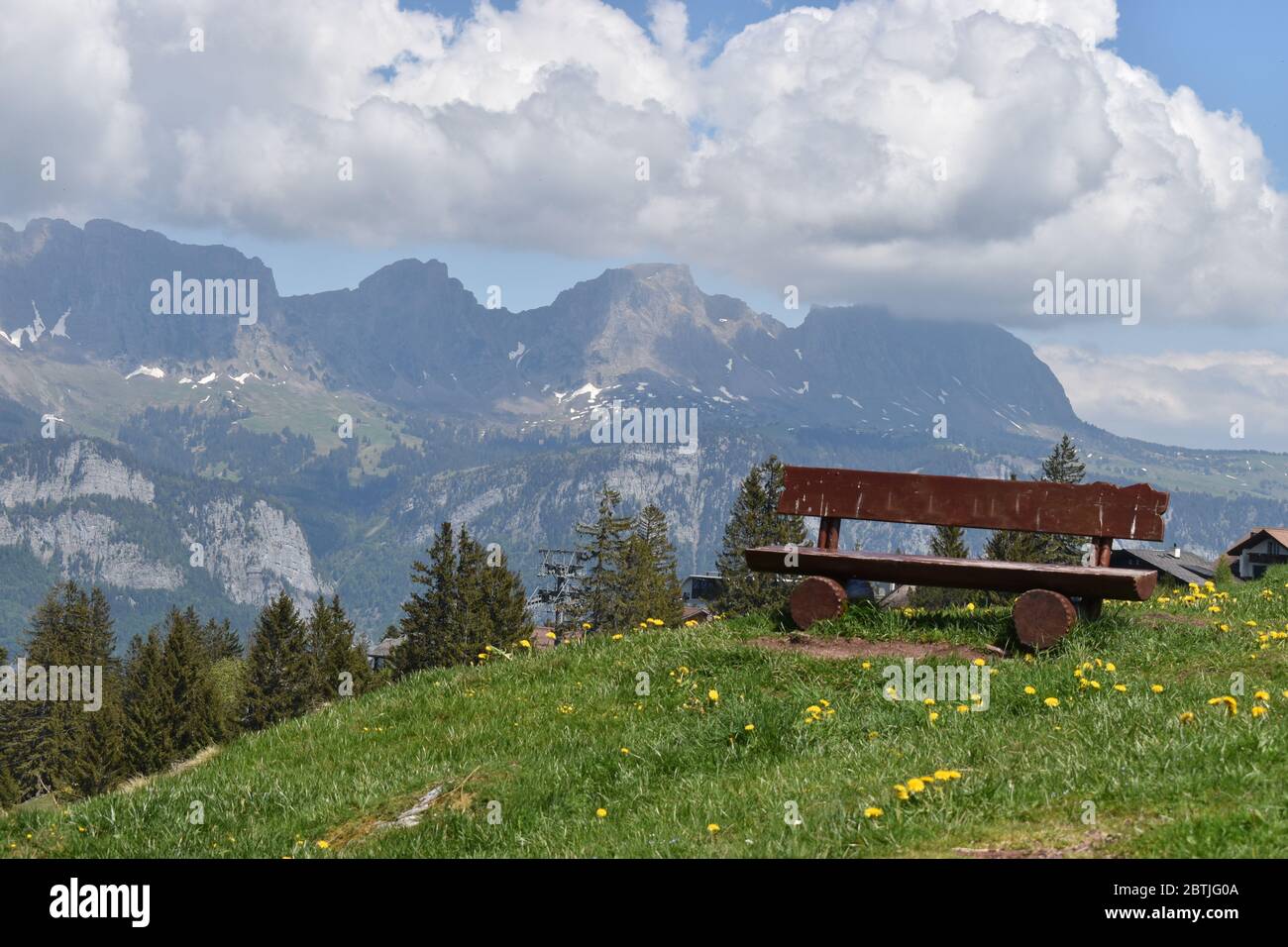 Empty bench to relax on Flumserberg in Switzerland Stock Photo - Alamy