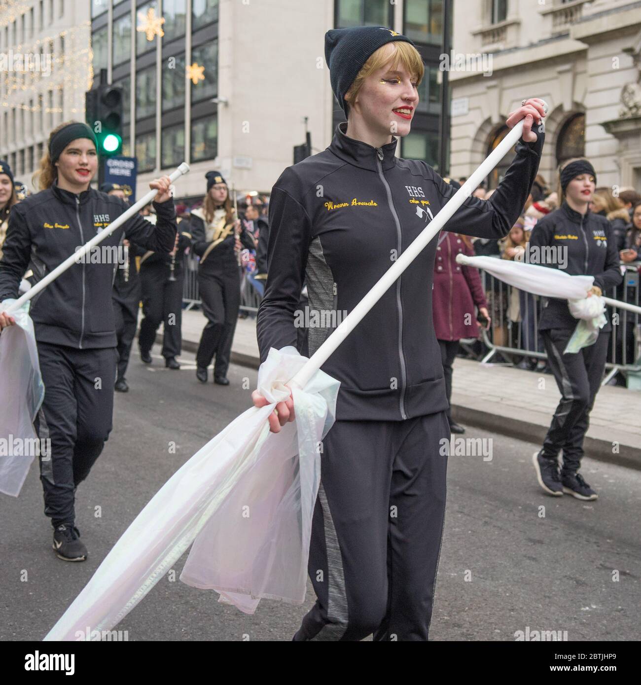 London New Year's DAY Parade 2020, Lady in black holding a white flag ...