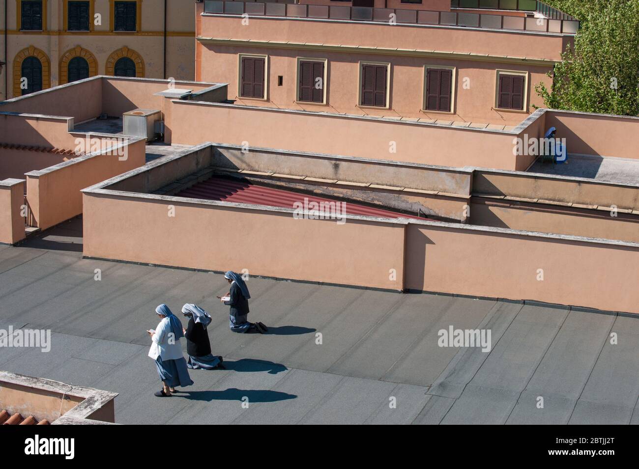Rome, Italy: Sisters of St. Anne's College pray on the roof of the ...