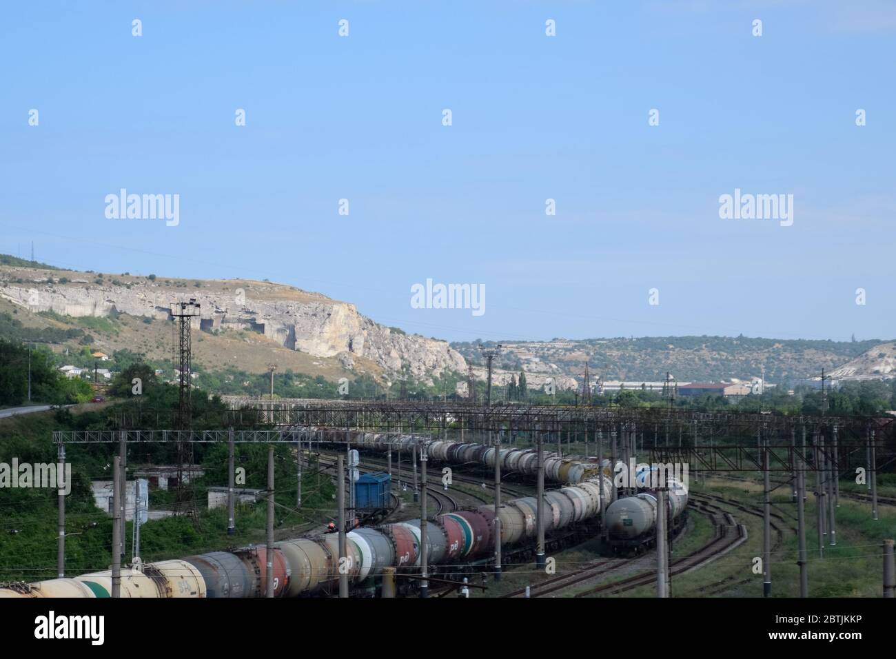 a Railroad tracks opposite the ancient quarry Stock Photo - Alamy