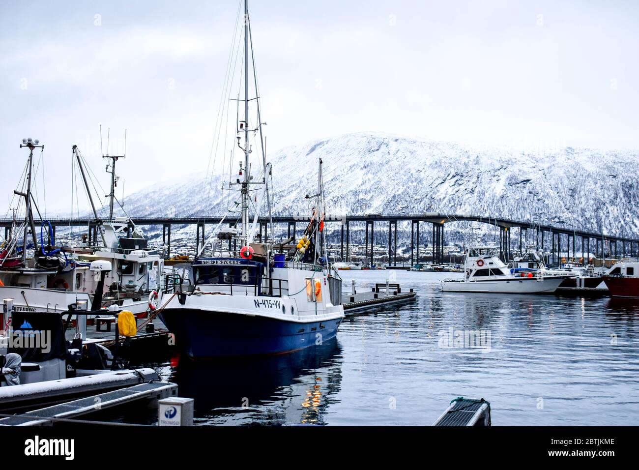 Boats in the Tromso harbour Stock Photo - Alamy