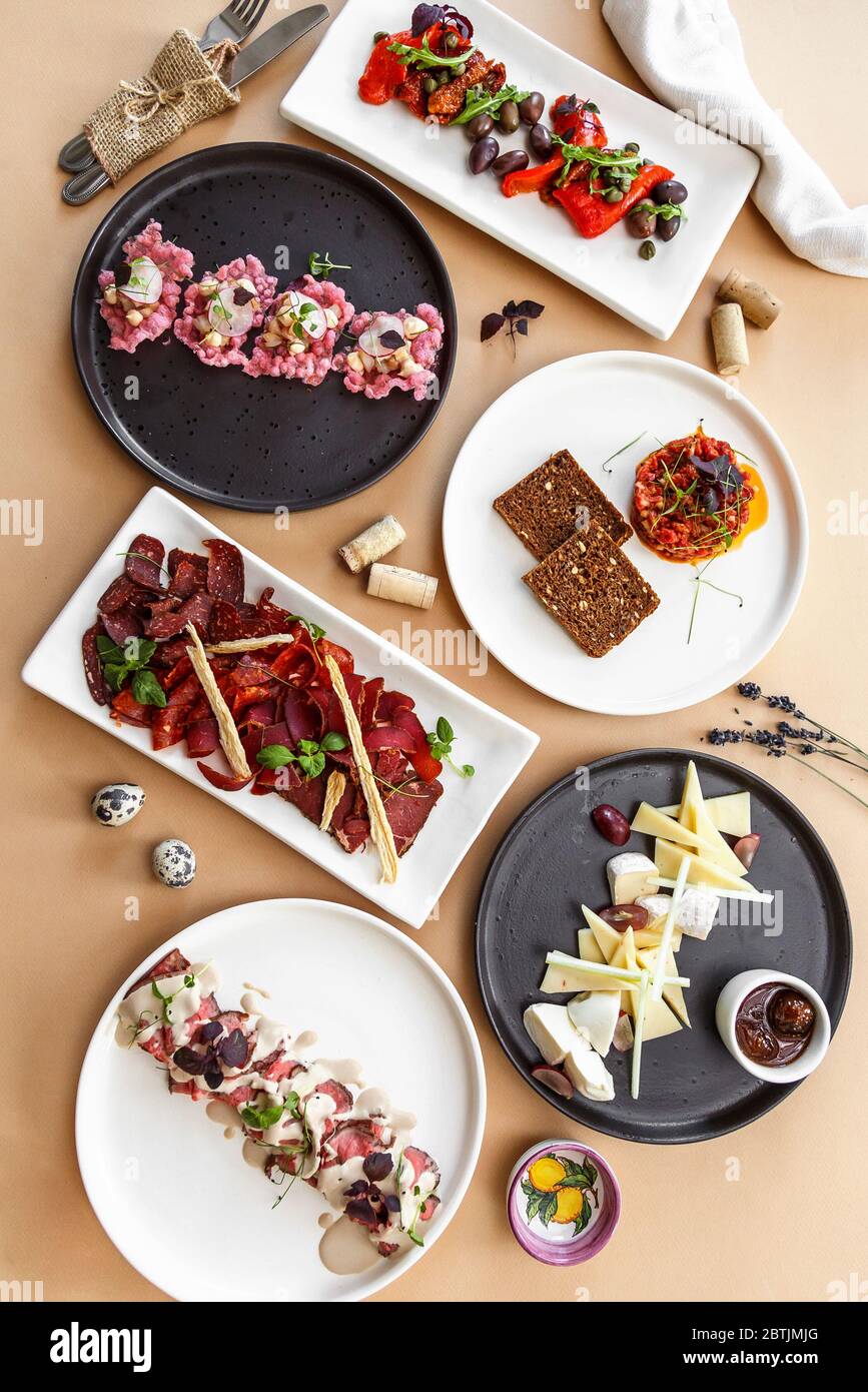 Fish and meat meals variety flat lay. Top view on buffet with ...