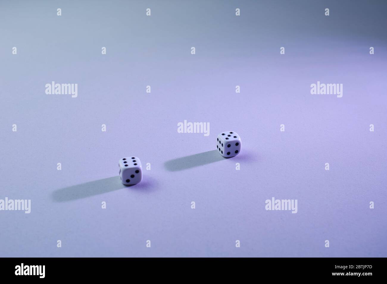 Two dice on white background, static Stock Photo - Alamy