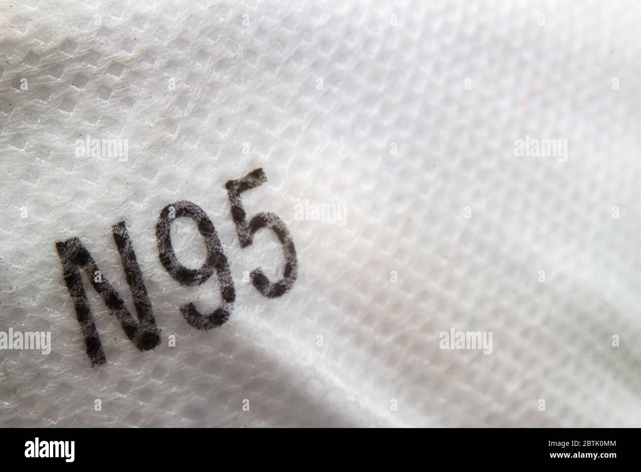 A close up to a N95 sign on a face mask ppe Stock Photo - Alamy