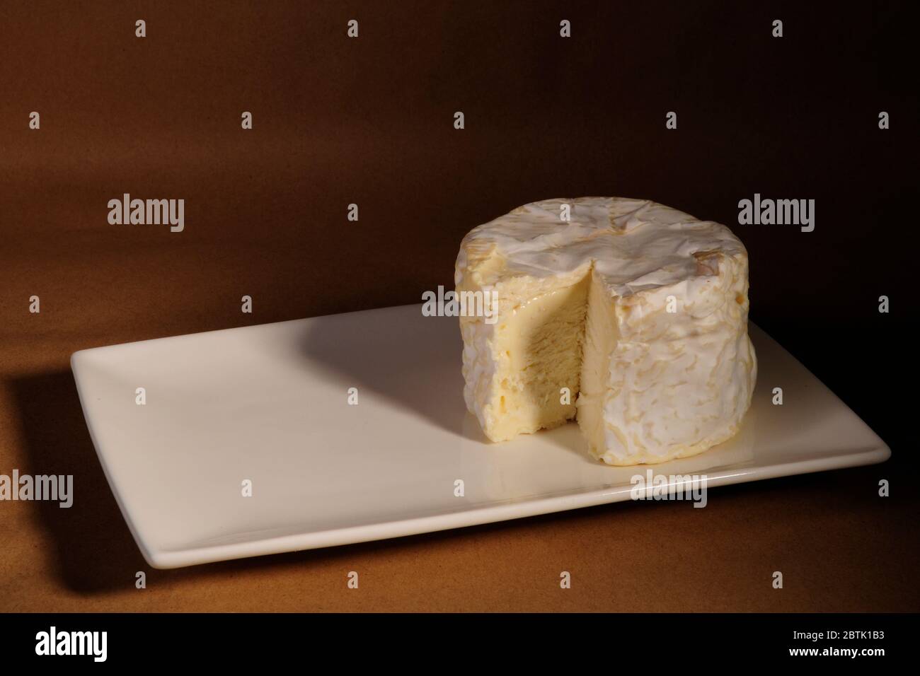 soft white creamy french cheese Stock Photo - Alamy