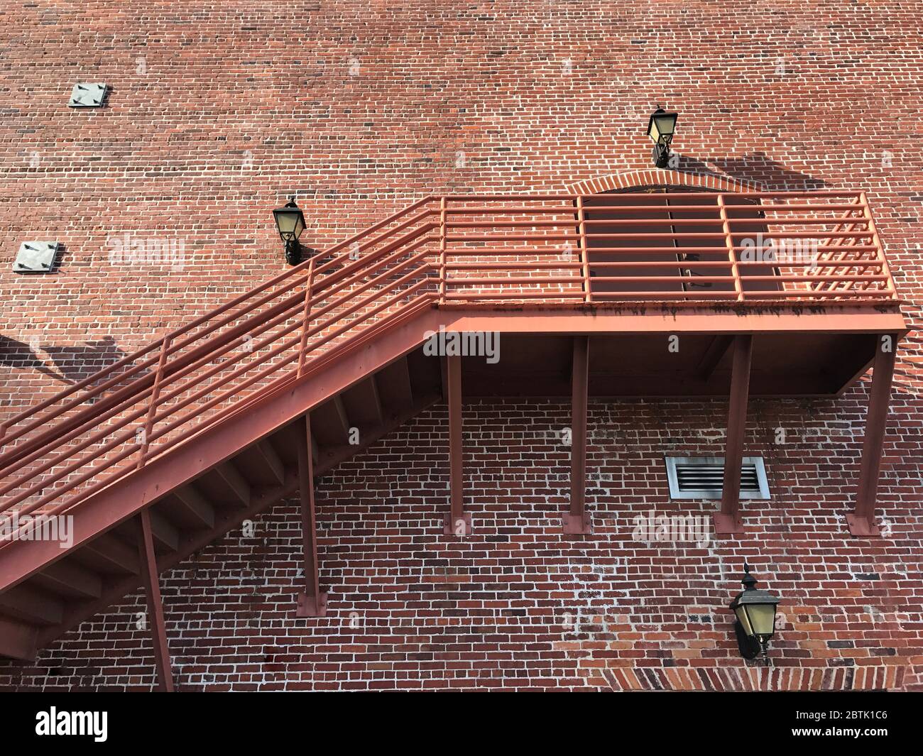 Overhang stair supported by exterior wall Stock Photo - Alamy