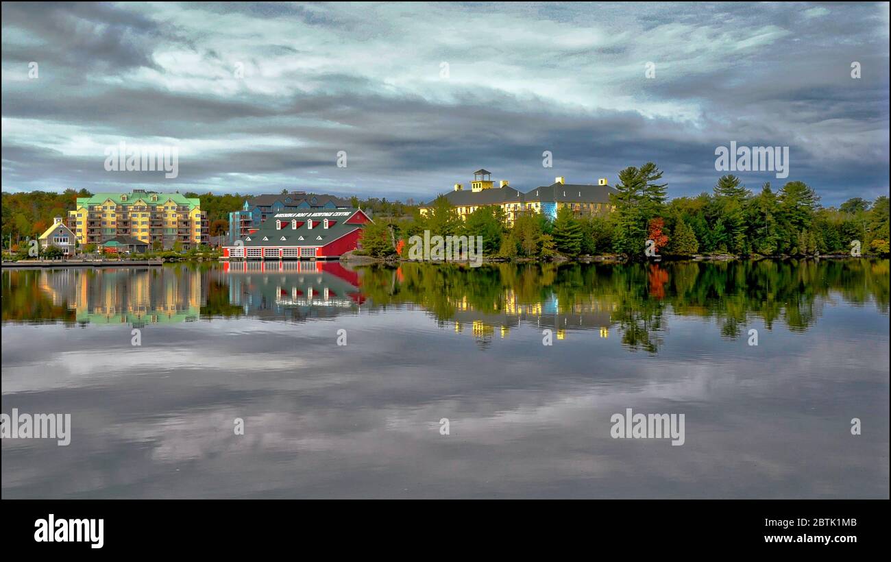 water reflection of the buildings in the waterfront in Gravenhurst ...