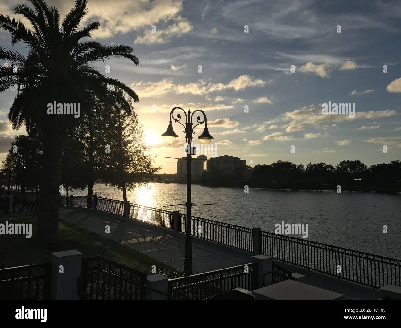 Lakeside area featuring a walking path outdoor sidewalks, boardwalks ...