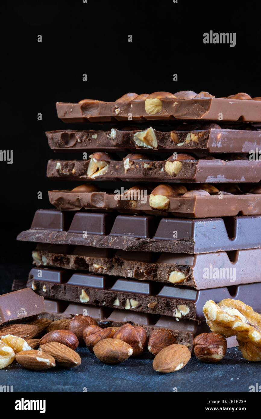 batch of chocolate with almonds and hazelnuts Stock Photo - Alamy