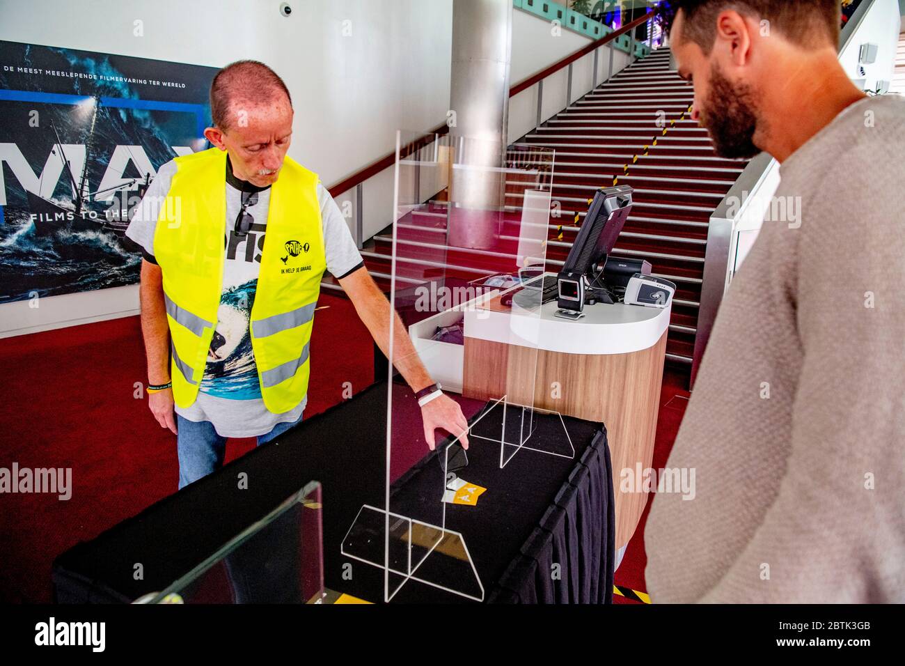 Ticket scanning area seen with plexiglass during the reopening ...