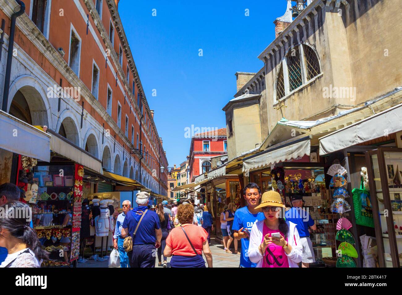 View of crowded Ruga dei Oresi street ,open market full of tourists ...