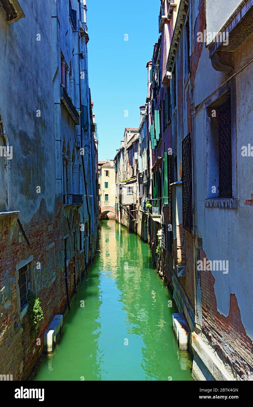 View of a quiet secluded canal unlike most other canals full of boats ...