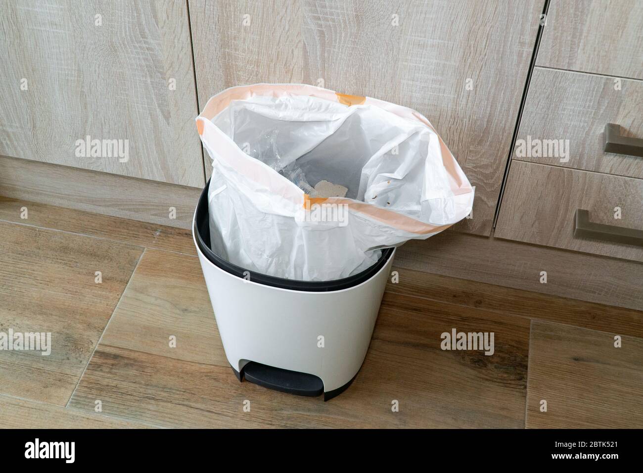 Garbage bin in the kitchen Stock Photo - Alamy