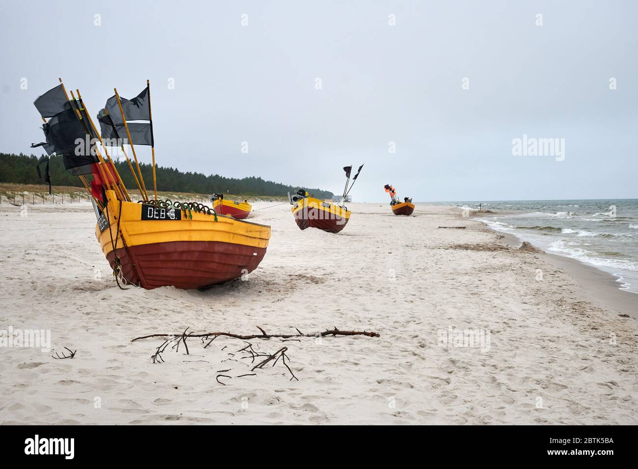Debki, Poland- May 25, 2020: Fishing boat on the beach on a cloudy and ...