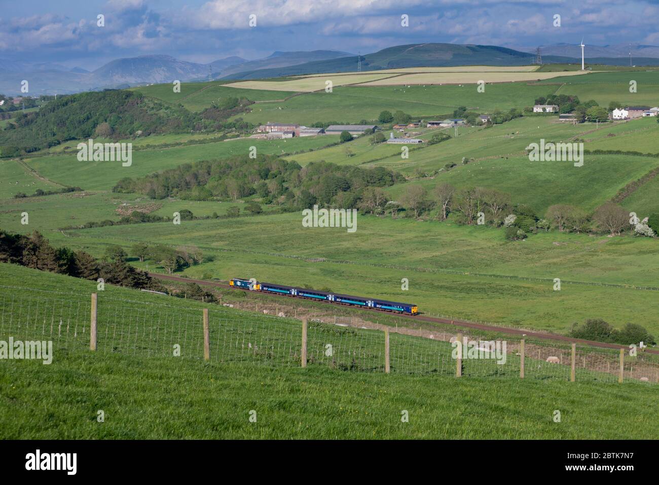 Northern rail train hauled by a class 37 locomotive in the countryside ...