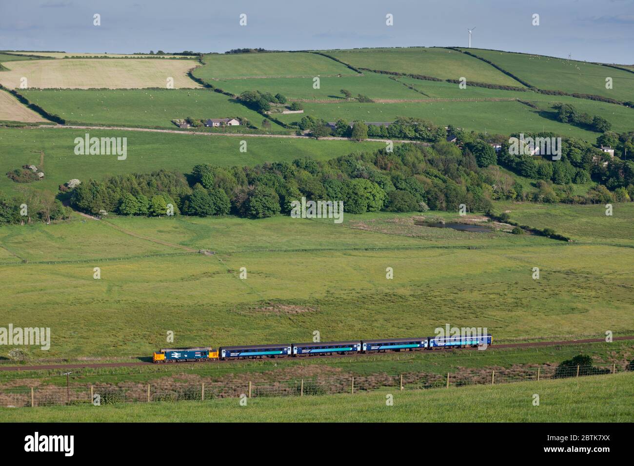 Northern rail train hauled by a class 37 locomotive in the countryside ...