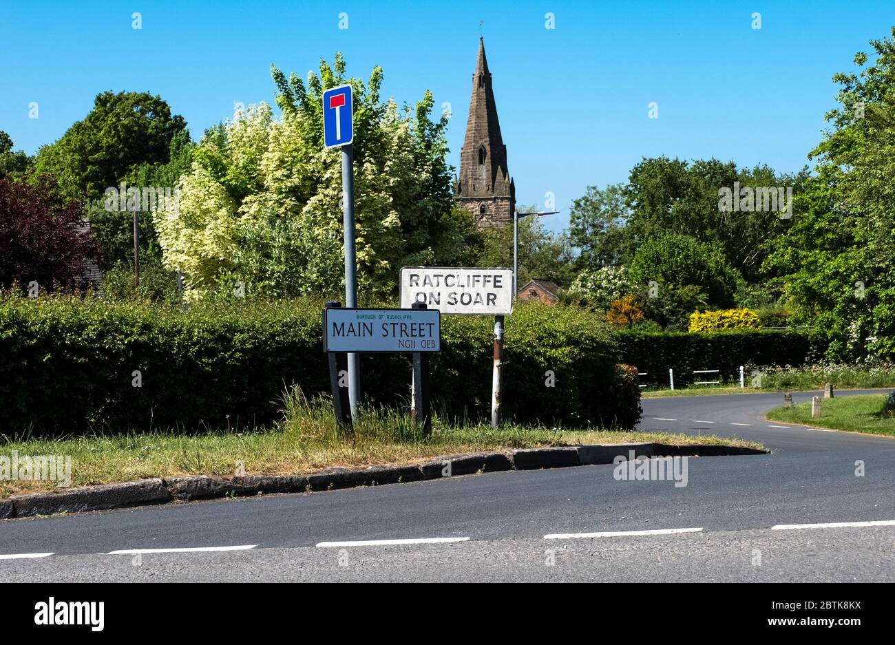 Road signs at a village road junction Stock Photo - Alamy