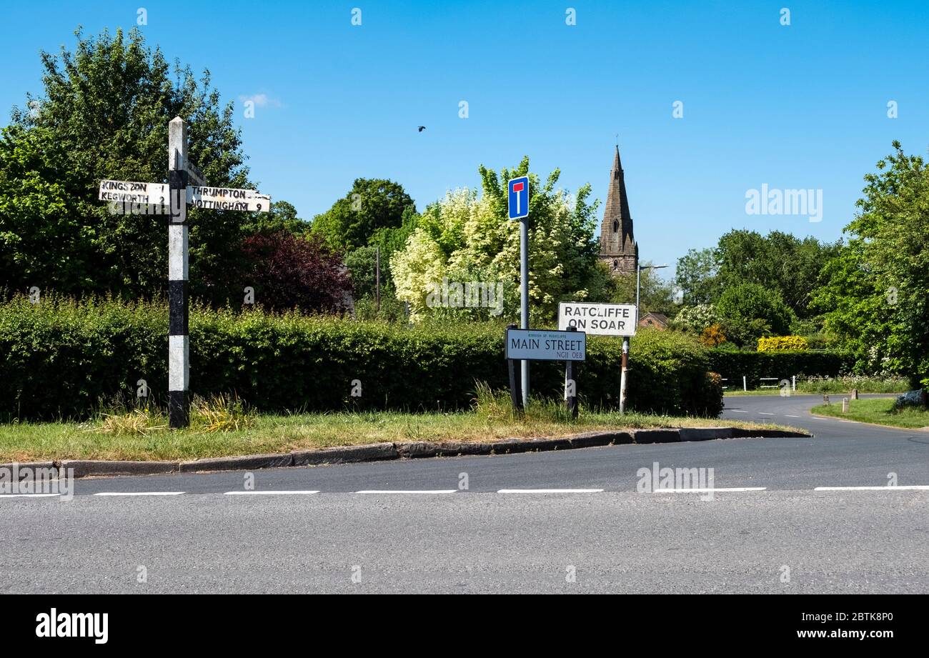 Road signs at a village road junction Stock Photo - Alamy