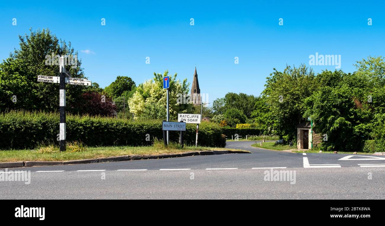 Road signs at a village road junction Stock Photo - Alamy