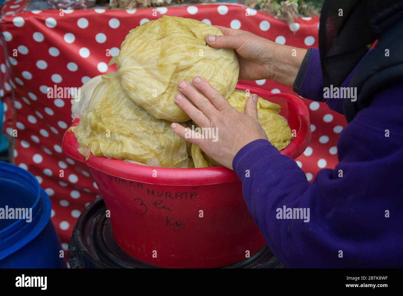 Woman selling pickled cabbage in a Romanian market, "Pickled Cabbage, 3 ...