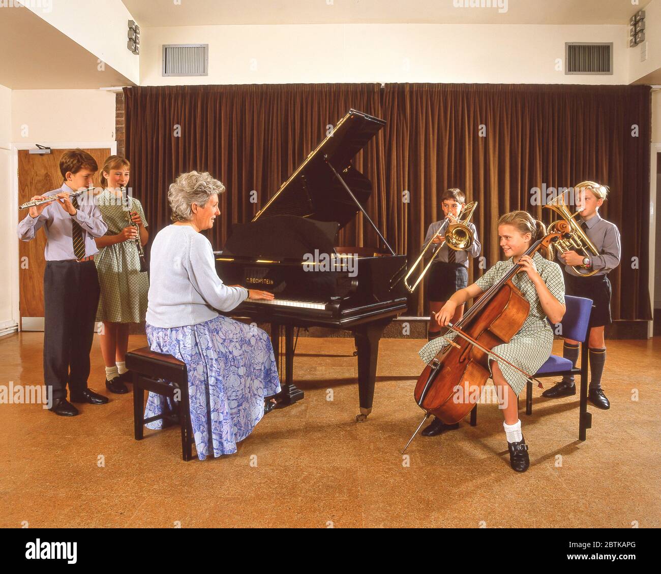 Children playing musical instruments hi-res stock photography and ...