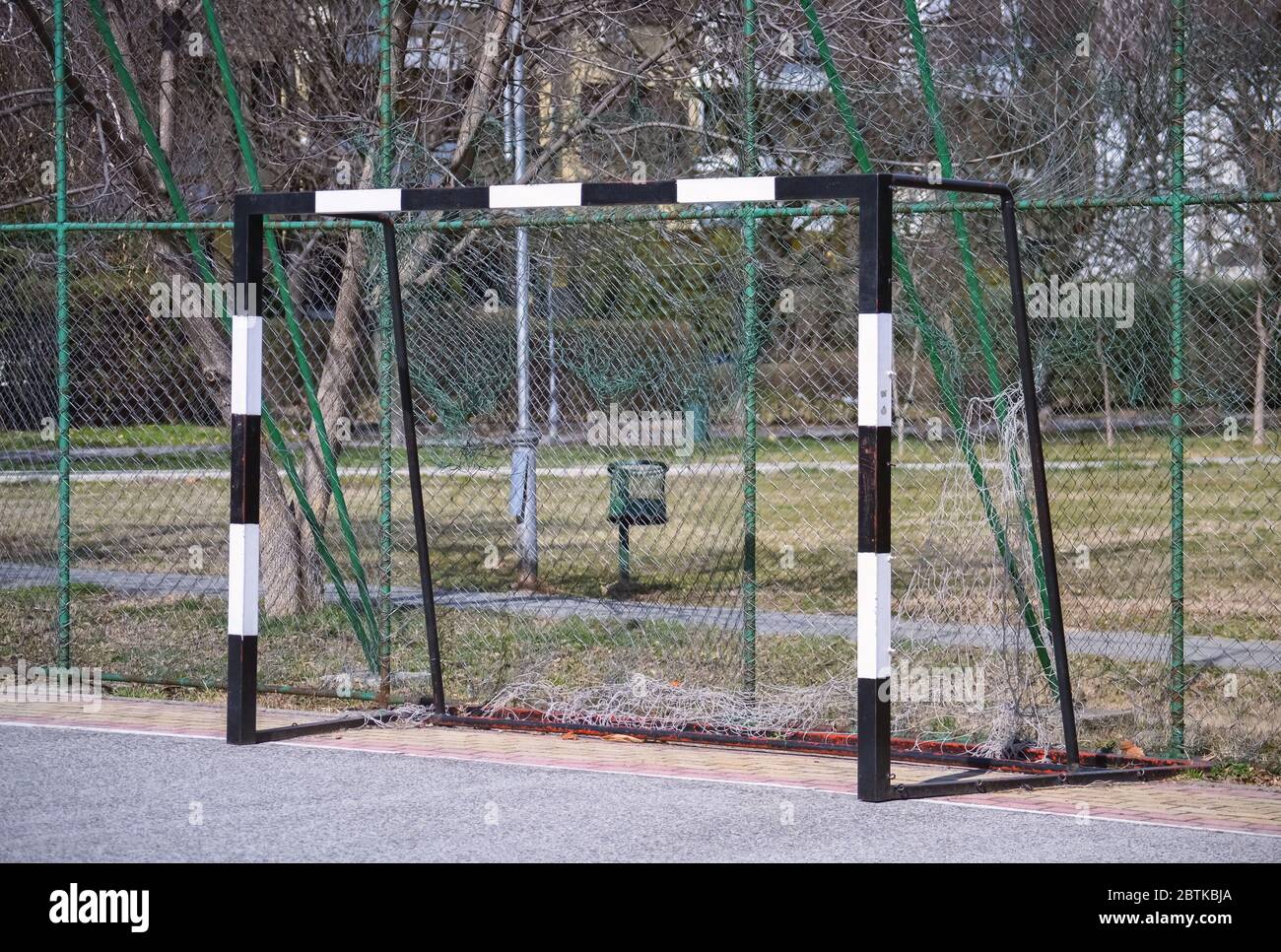 Detail of a small football playfield and goal frame for recreative ...
