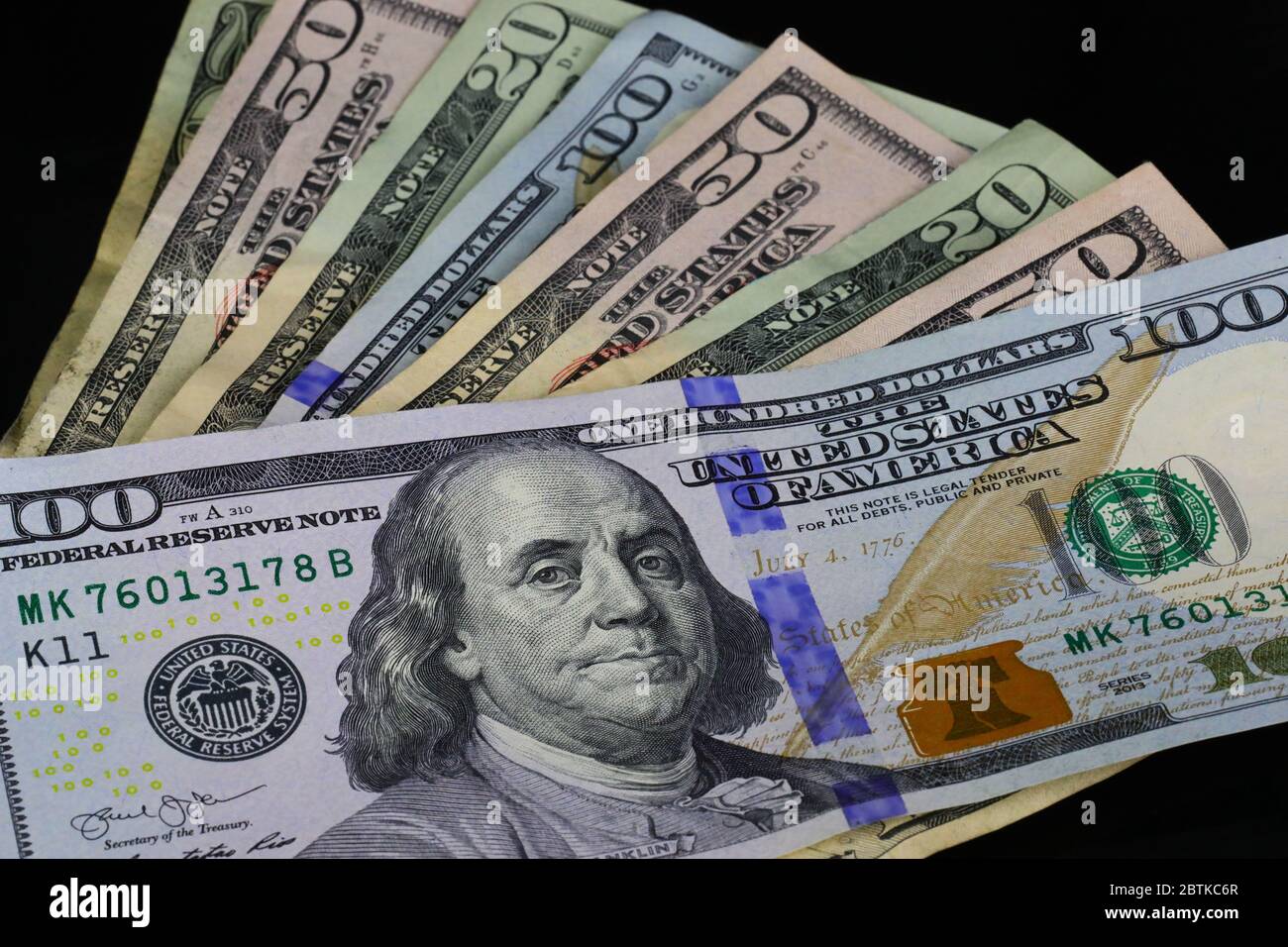 Assortment of money in multiple denominations Stock Photo - Alamy