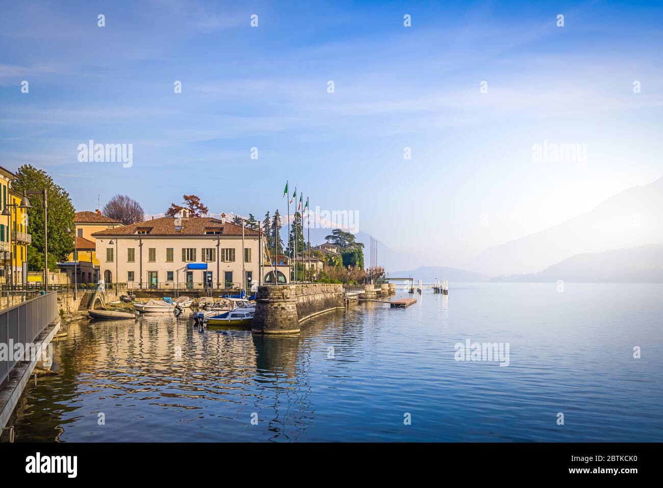 Pacifying morning landscape with snowy peaks of Alps and calm water ...