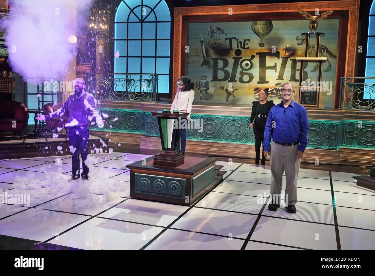 THE BIG FIB, host Yvette Nicole Brown (2nd from right) with contestants ...