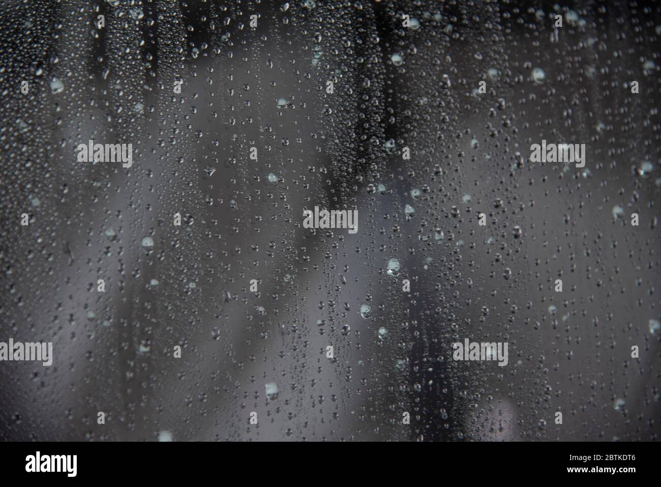 Full frame car glass covered with water drops as a backdrop Stock Photo ...