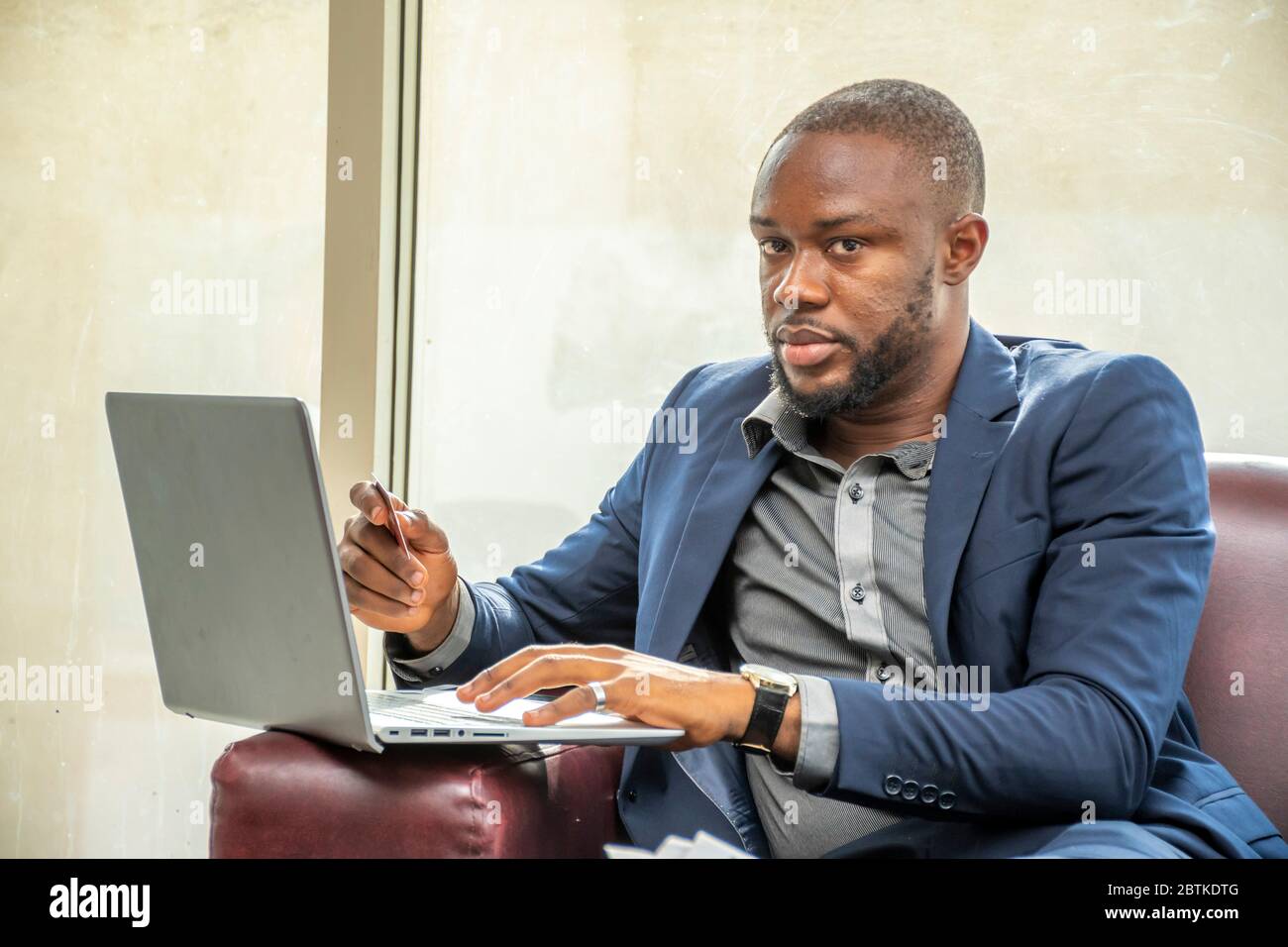 African banker hi-res stock photography and images - Alamy