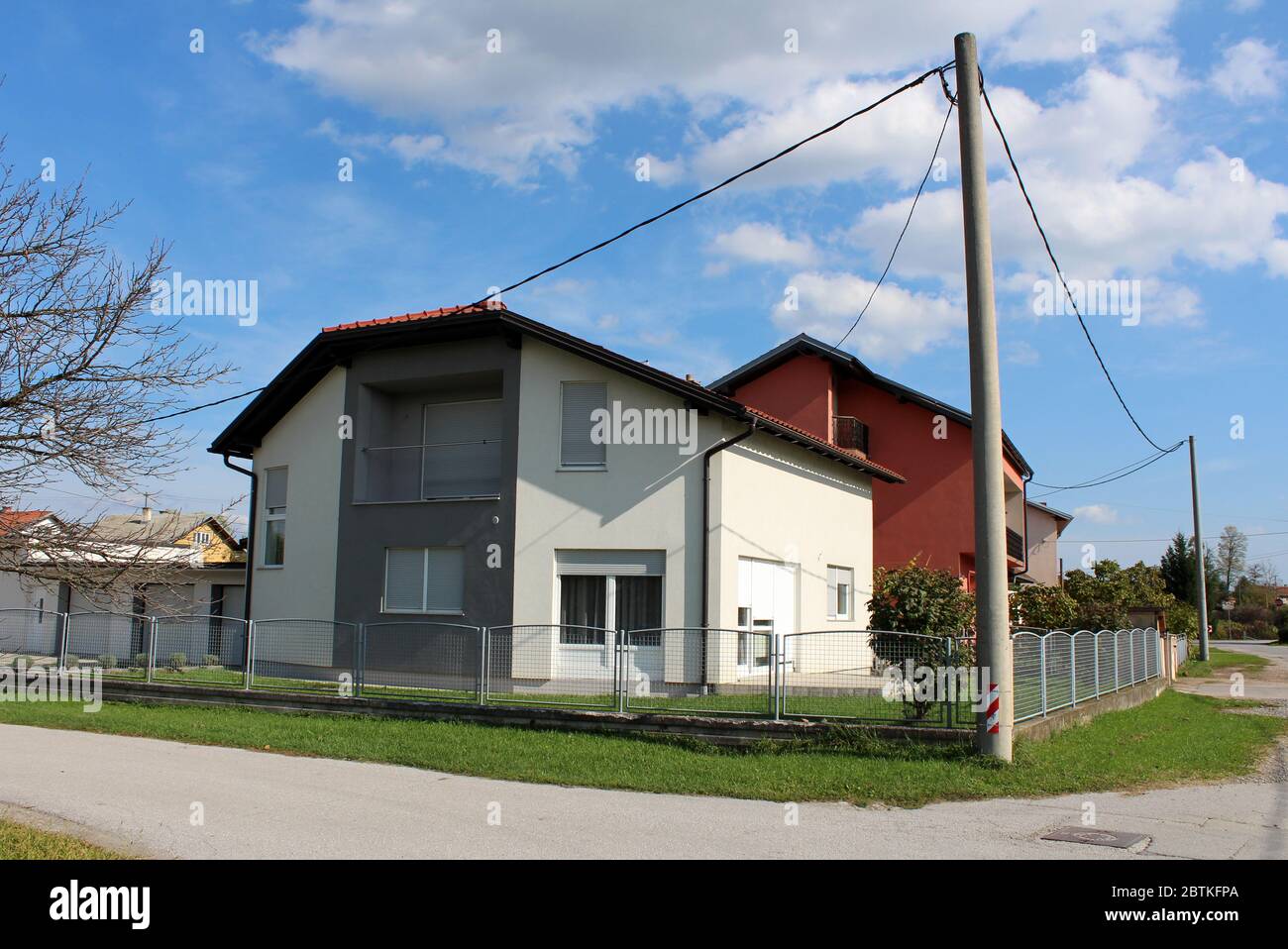 Concrete electrical utility pole with multiple electrical wires ...