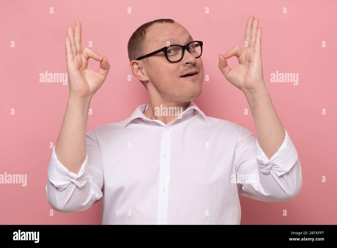 Casual handsome looking for a business friendly adult sign hi-res stock ...