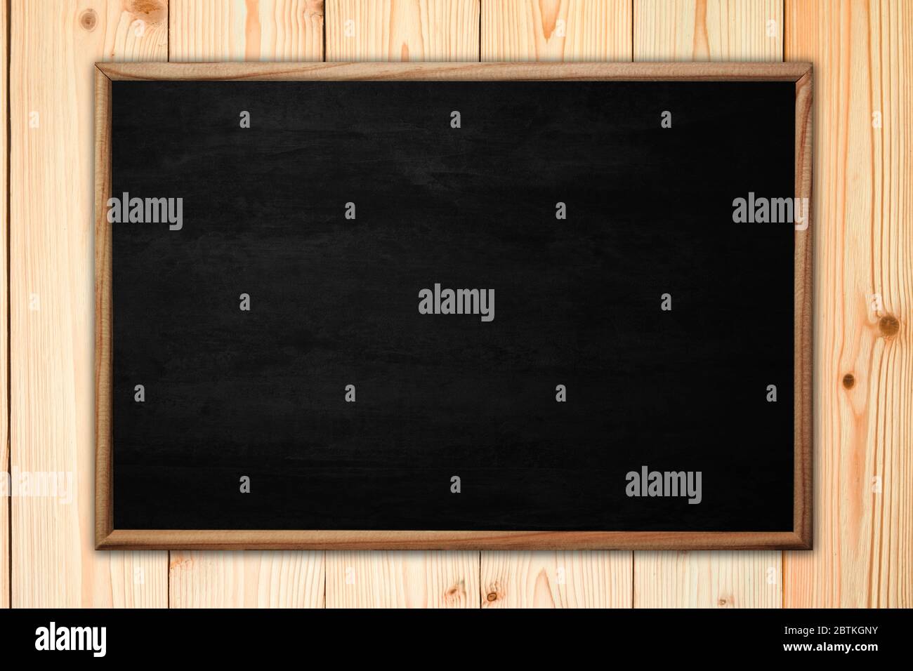 Abstract blackboard or chalkboard with frame on wooden background ...