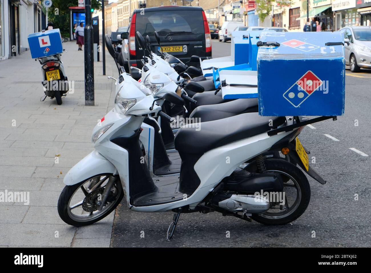 Dominos delivery moped hi-res stock photography and images - Alamy