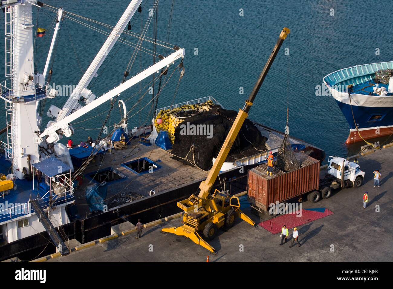 Unloading Tuna from fishing boat, City of Manta, Manabi Province ...