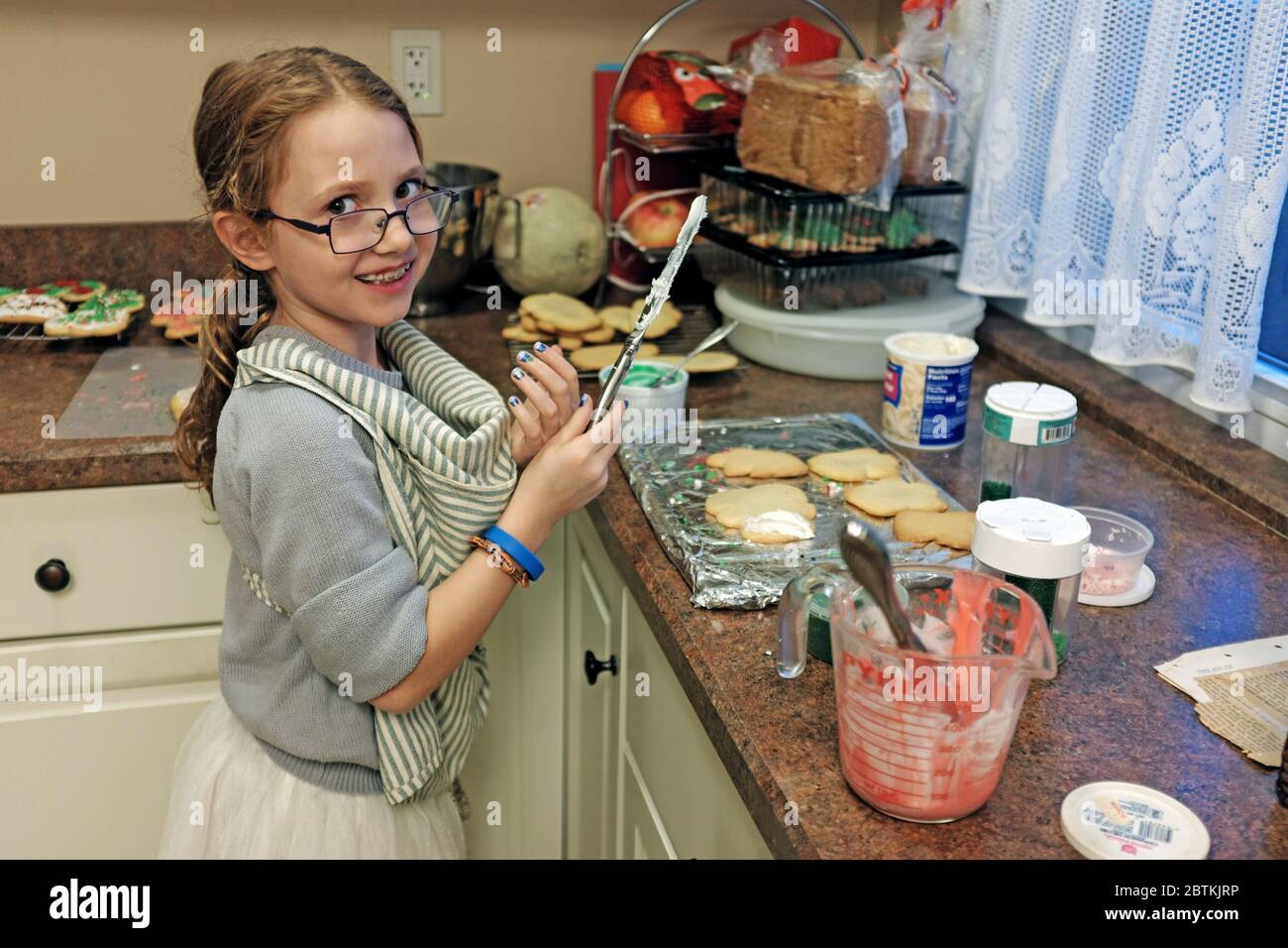 Young girl making cookies hi-res stock photography and images - Alamy