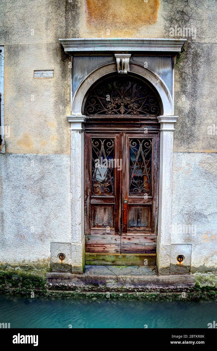 Venice Door with Canal Stock Photo - Alamy