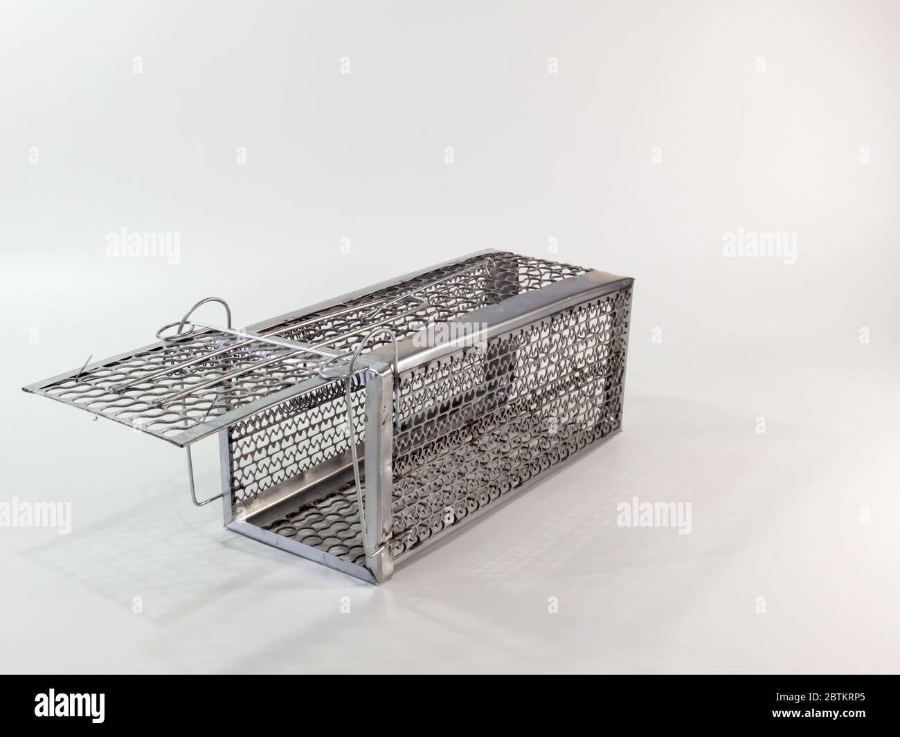 Cage mouse trap on white background Stock Photo - Alamy