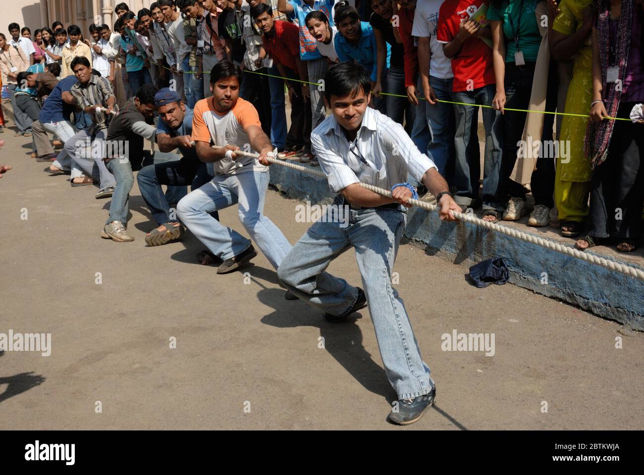Boy pulling rope asia hi-res stock photography and images - Alamy