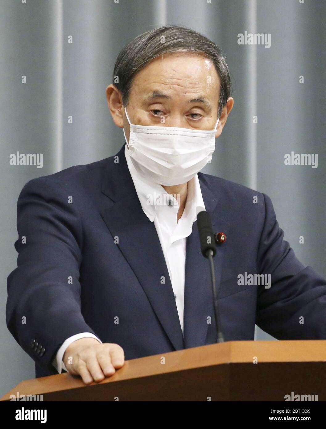 Japanese Chief Cabinet Secretary Yoshihide Suga speaks at a press ...