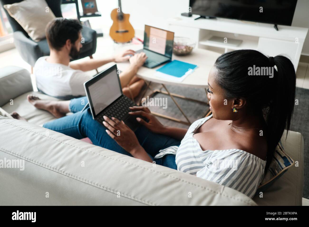 African american couple working from hi-res stock photography and ...